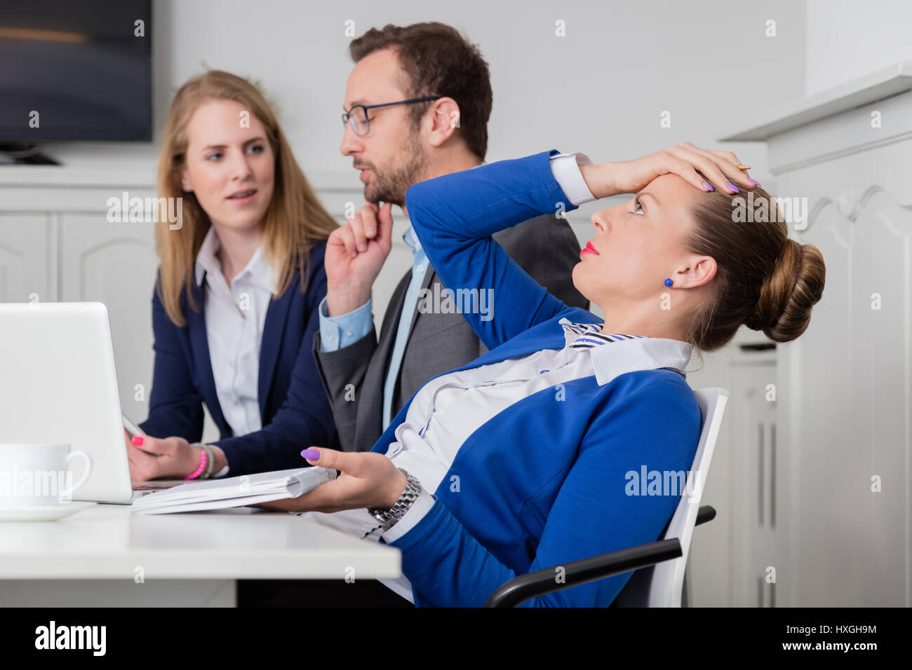 Woman ignore colleagues hi-res stock photography and images - Alamy