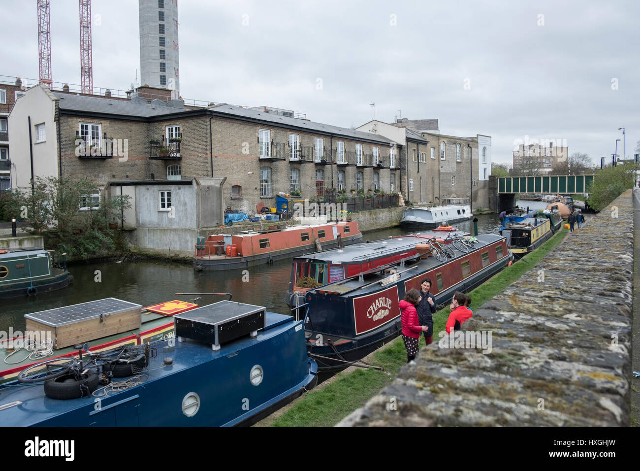 Canal side conversation Stock Photo - Alamy