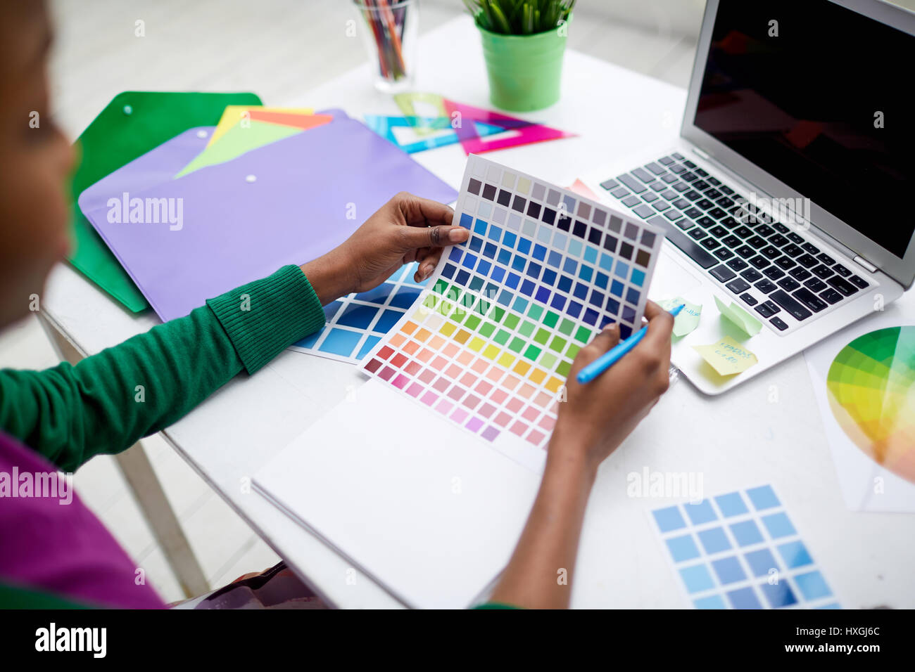 Designer working with color palette Stock Photo - Alamy