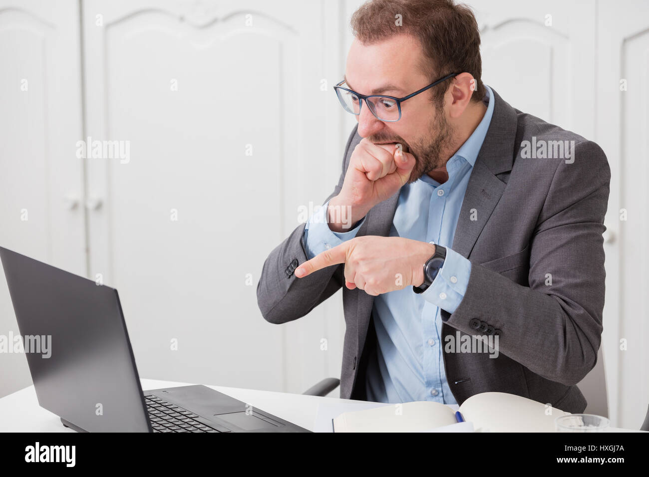 Businessman under stress after realized that he made a mistake Stock ...