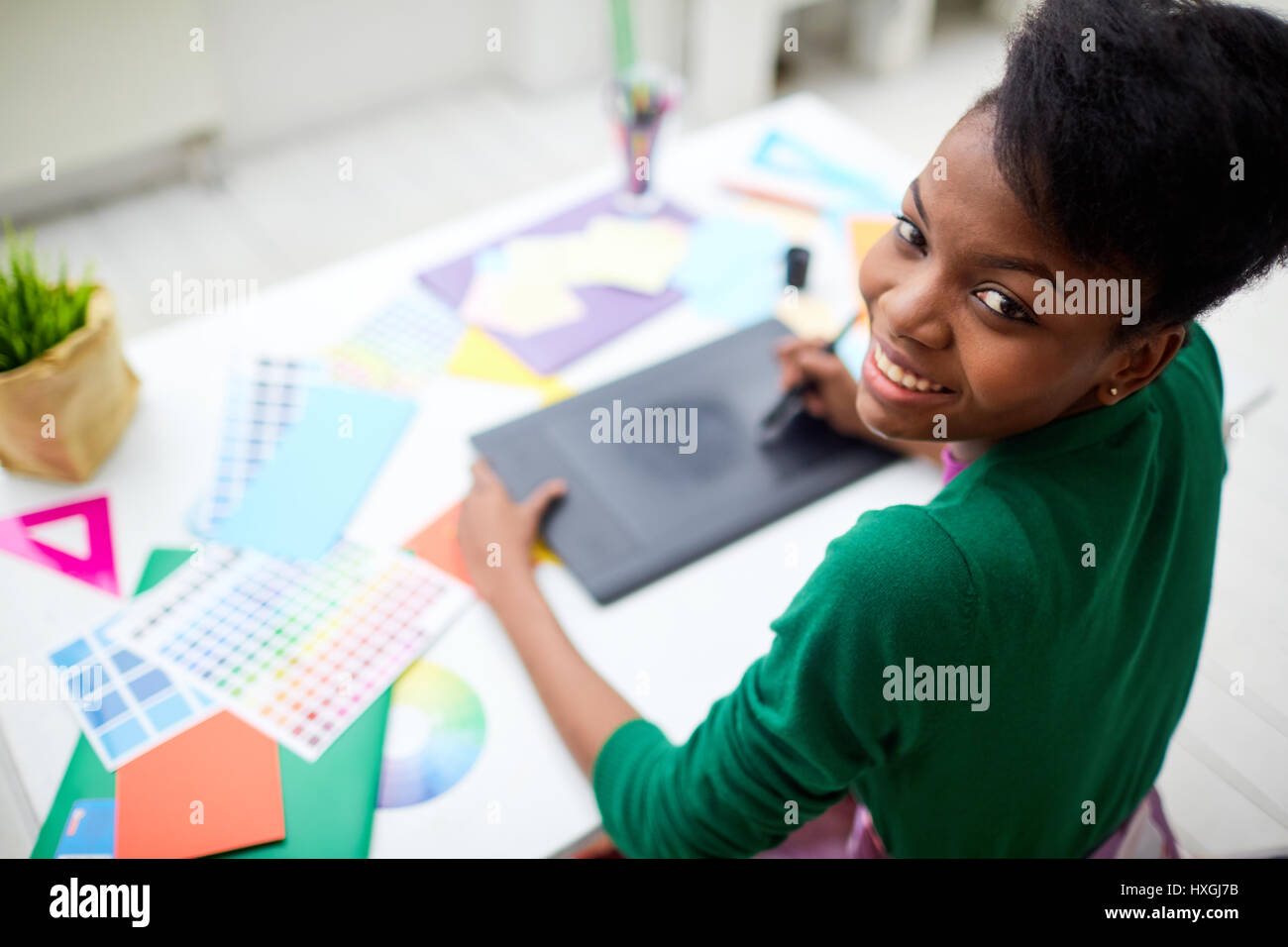 Happy designer hi-res stock photography and images - Alamy