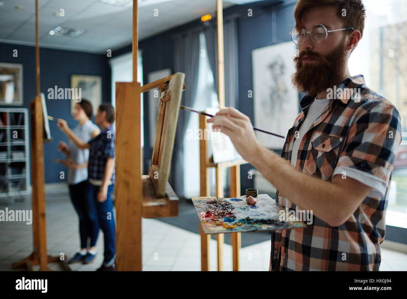 Modern artist learning to paint in school of arts Stock Photo - Alamy