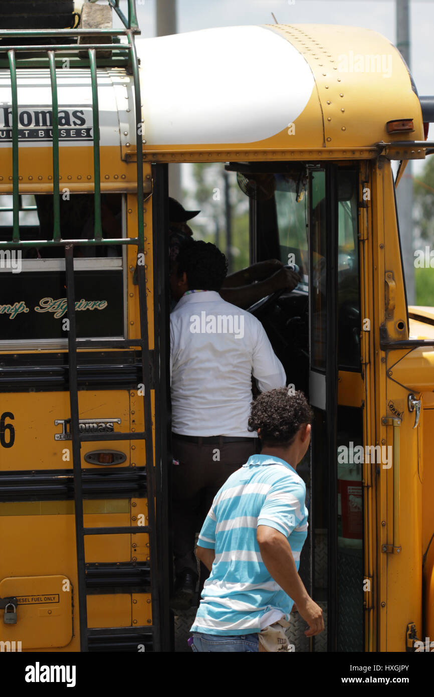 People are getting on and off the bus in Nicaragua, a cheapest way to ...