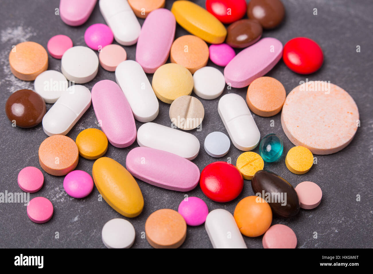 different tablets pills capsule heap mix therapy drugs Stock Photo - Alamy