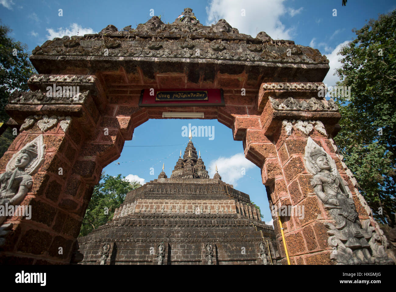 the wat tham pla or monkey cave temple near the town of Mae Sai in ...