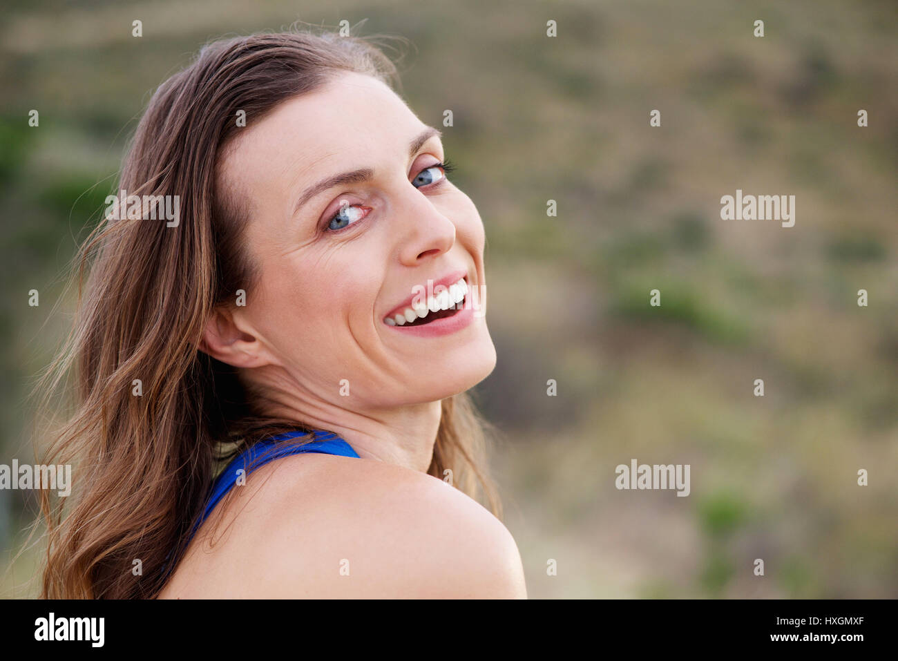 Close up portrait of healthy older woman smiling outside Stock Photo ...