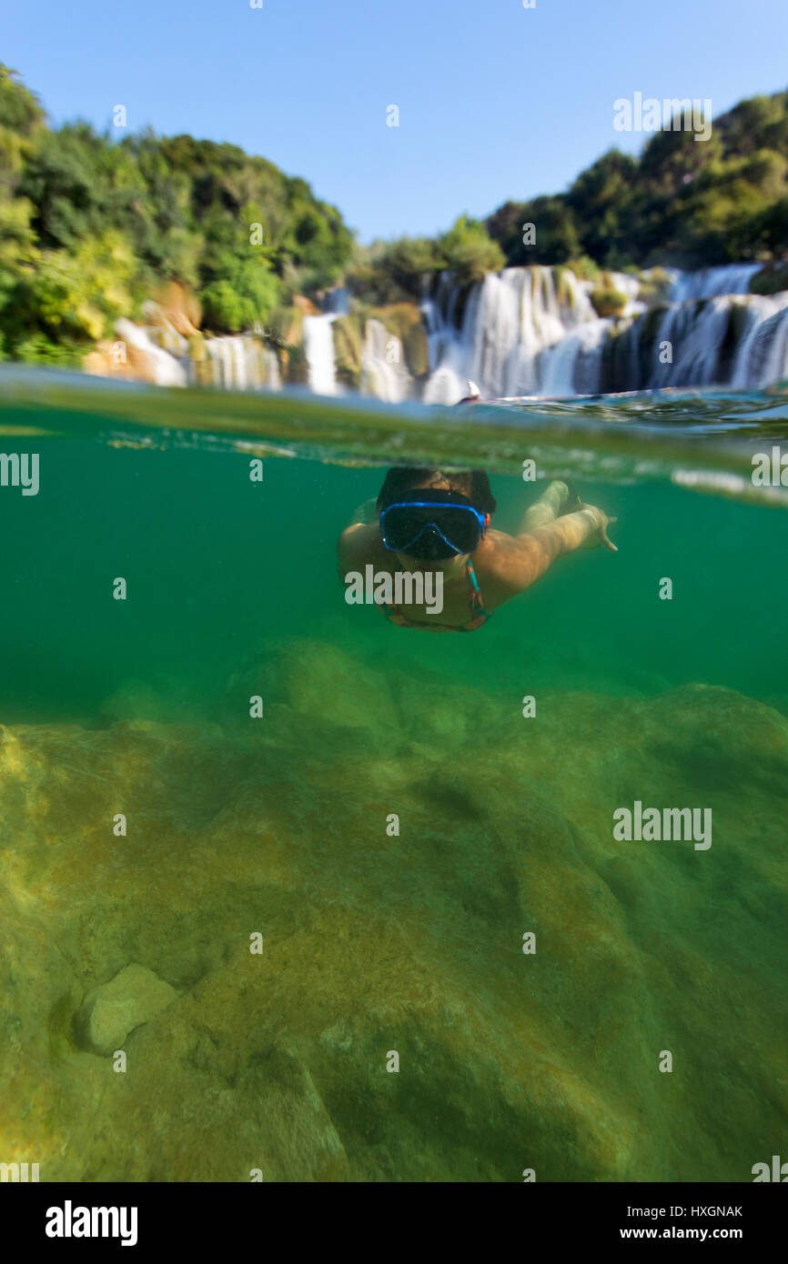 Girl under waterfall hi-res stock photography and images - Alamy