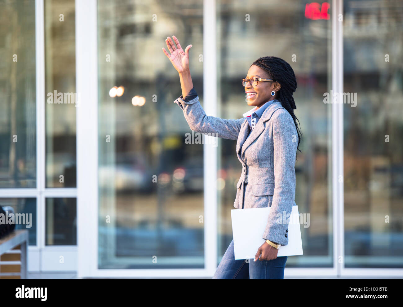 Woman waving bus hi-res stock photography and images - Alamy