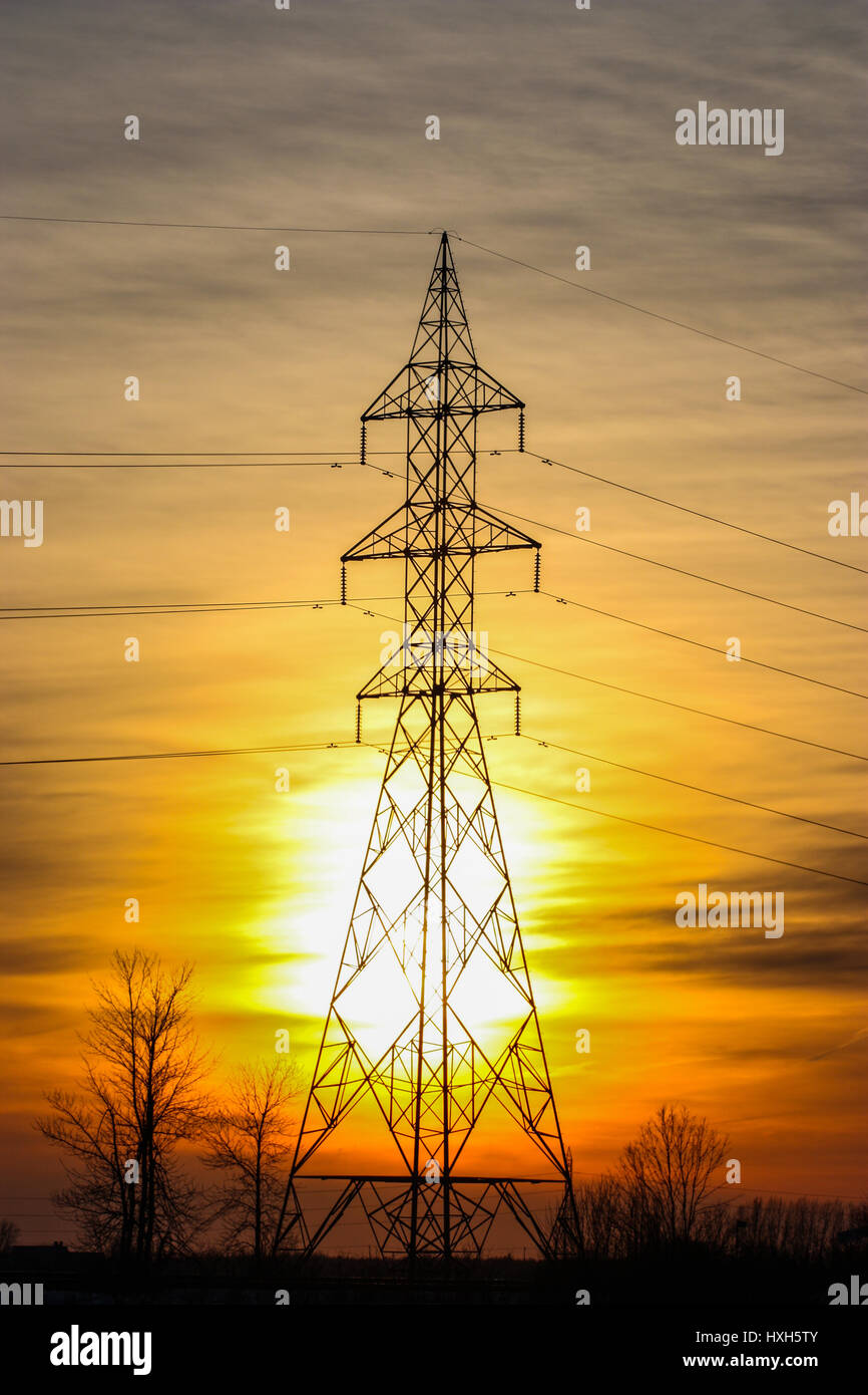 electric poles in the sunset Stock Photo - Alamy