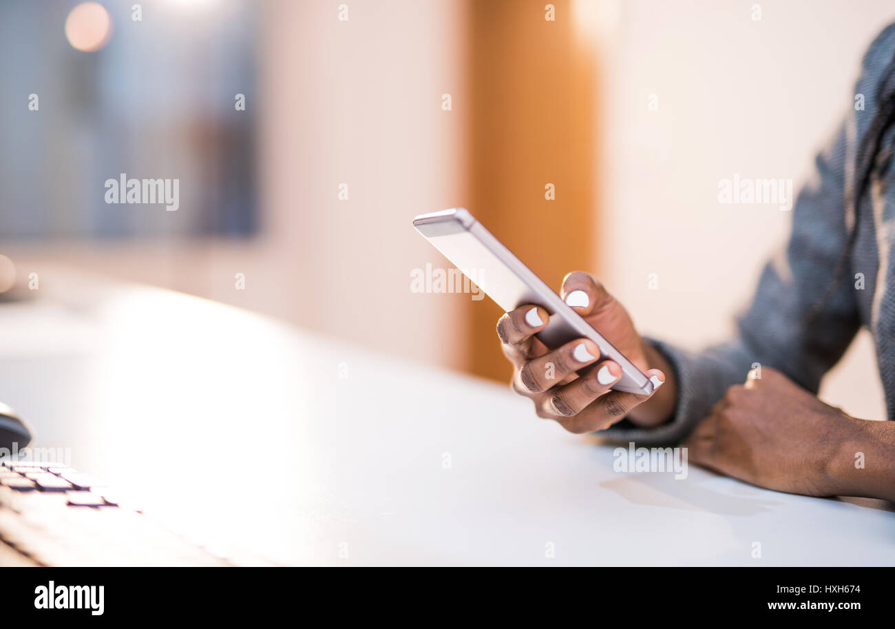 She does all the work on her phone close up Stock Photo - Alamy