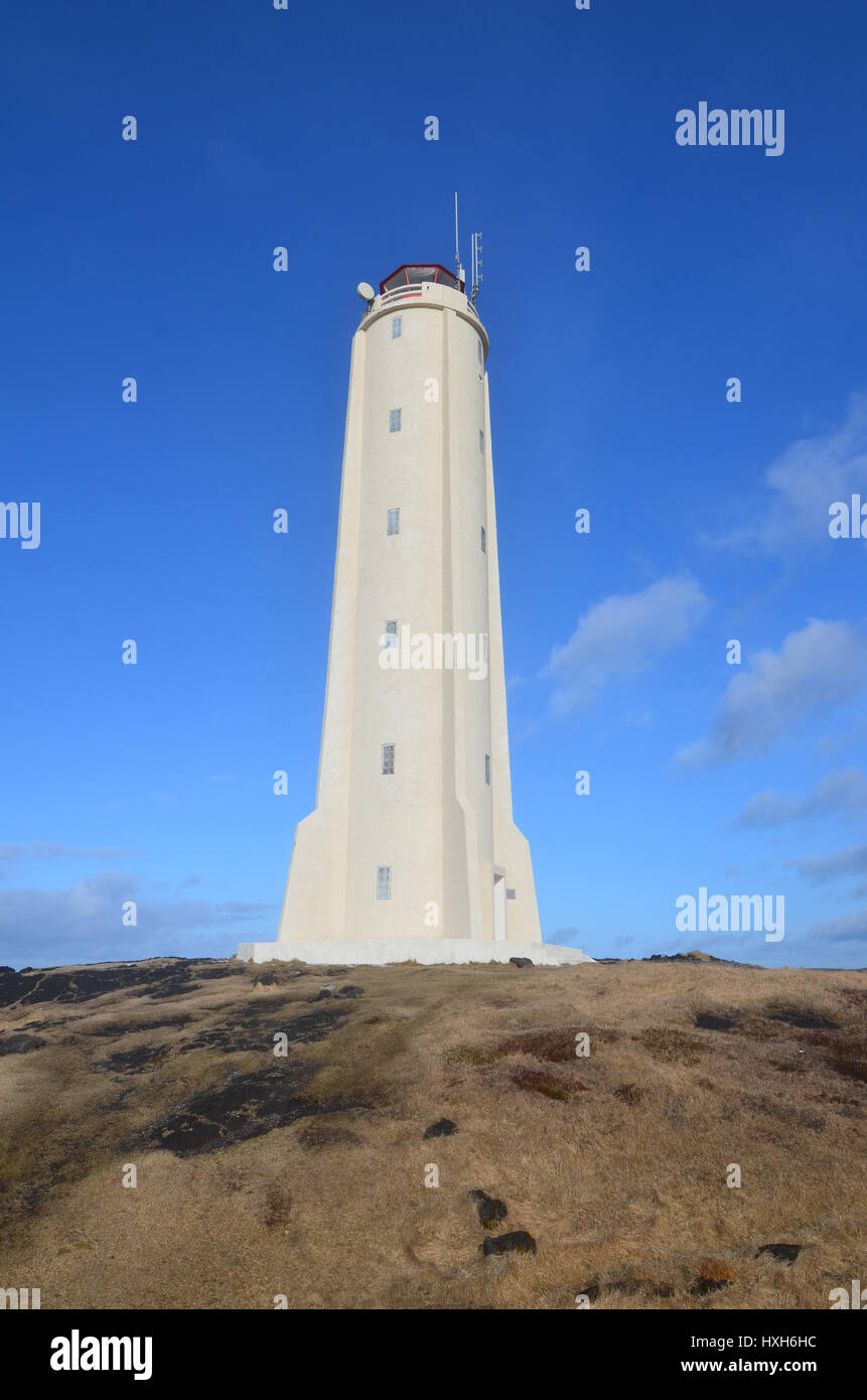 White Malarrif Lighthouse against a dark blue sky in Iceland Stock ...