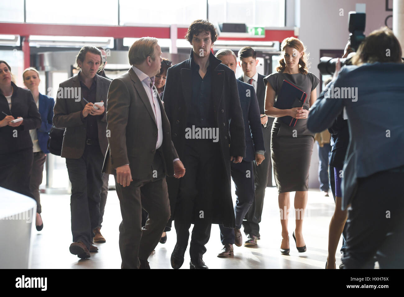 SHERLOCK, Toby Jones (left-center, back to camera), Benedict ...