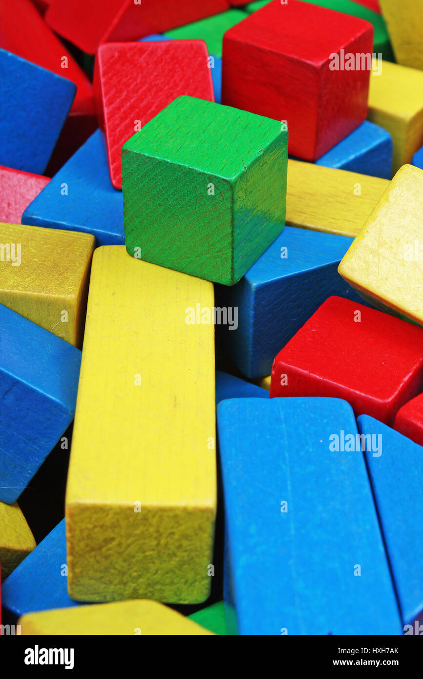 Wooden toy background. Red, Blue, Yellow Green Wooden toy blocks on ...