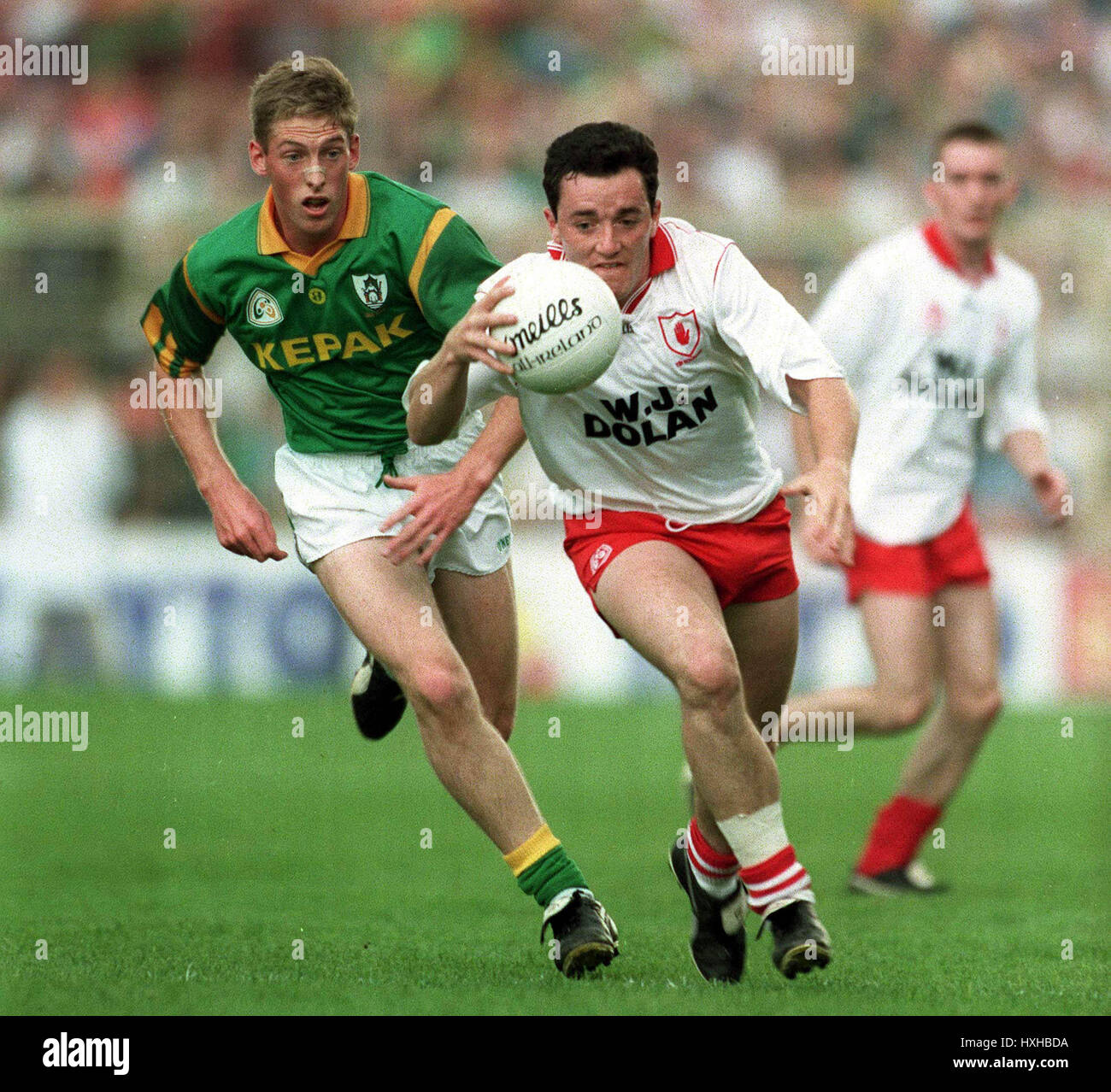 BRIAN DOOHER PULLS AWAY TYRONE V MEATH 09 October 1996 Stock Photo - Alamy