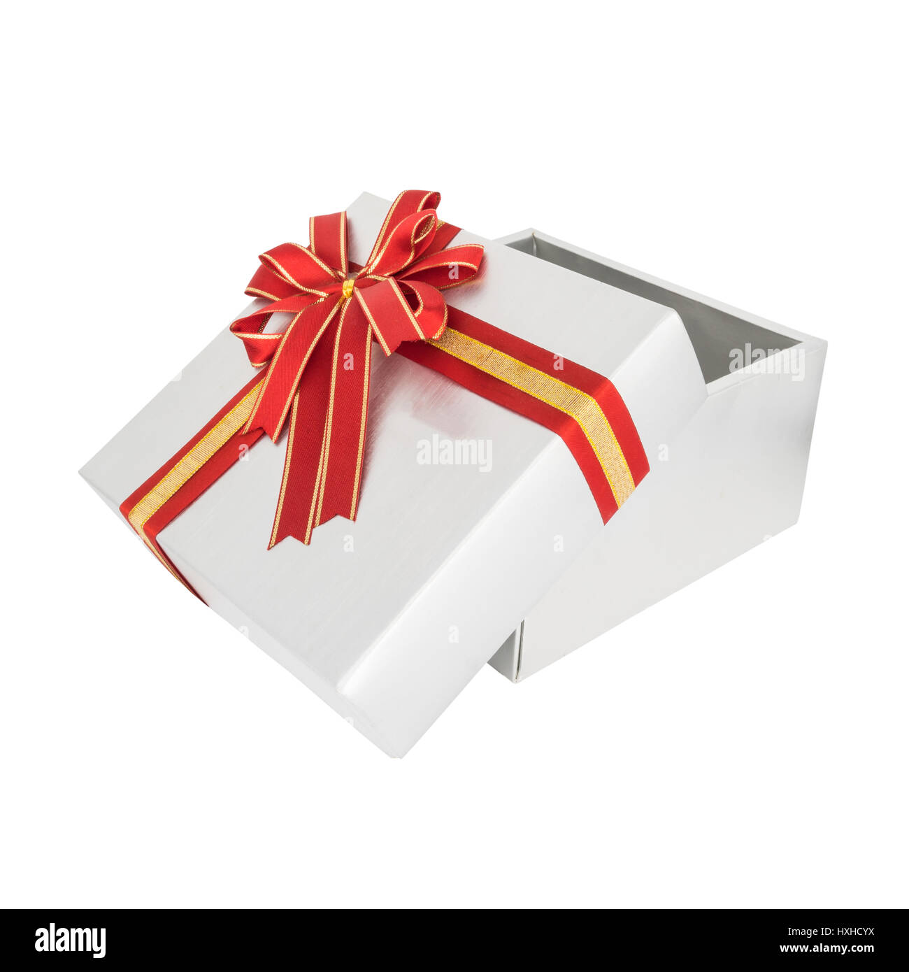 Gift box and red ribbon isolated on white background Stock Photo - Alamy