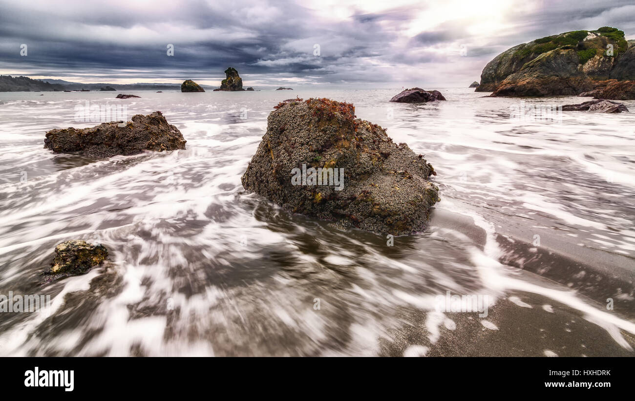 Rocky Beach Landscape at Sunset, Color Image, Day Stock Photo - Alamy
