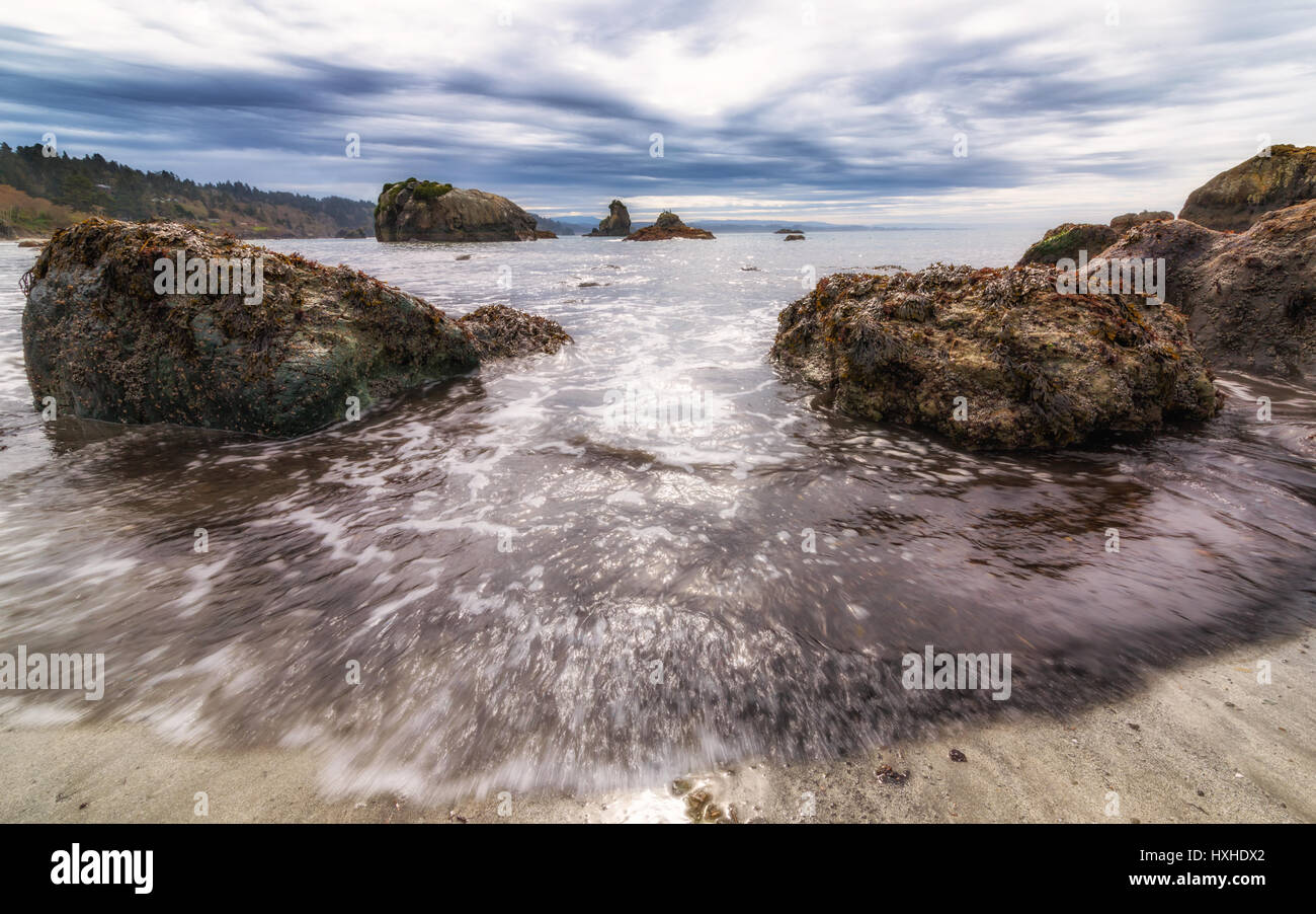 Rocky Beach Landscape at Sunset, Color Image, Day Stock Photo - Alamy