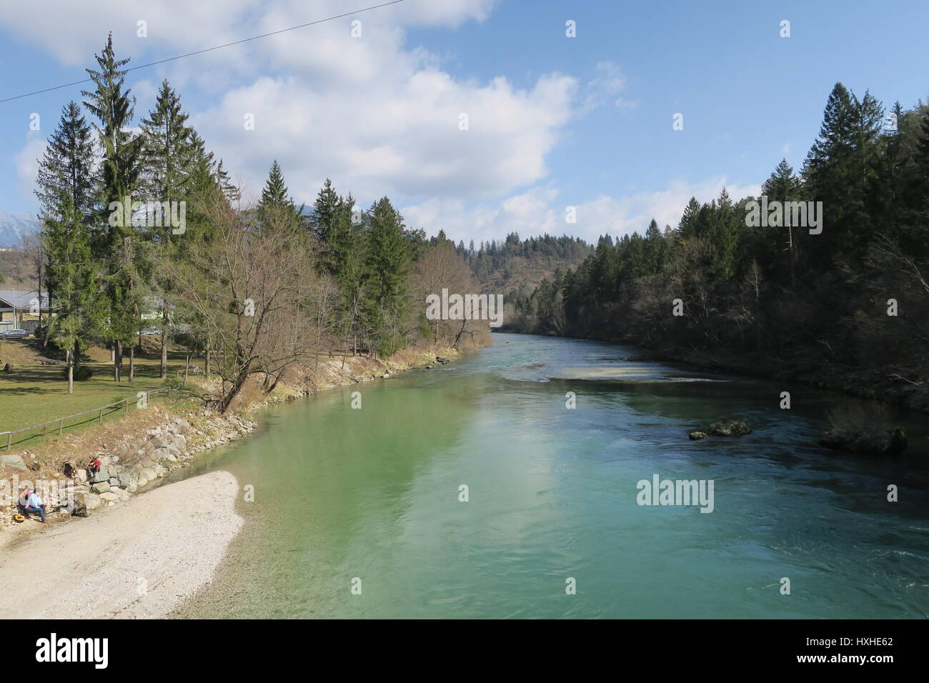 The Sava river in Upper Carniola in town Radovljica slowly runs ...