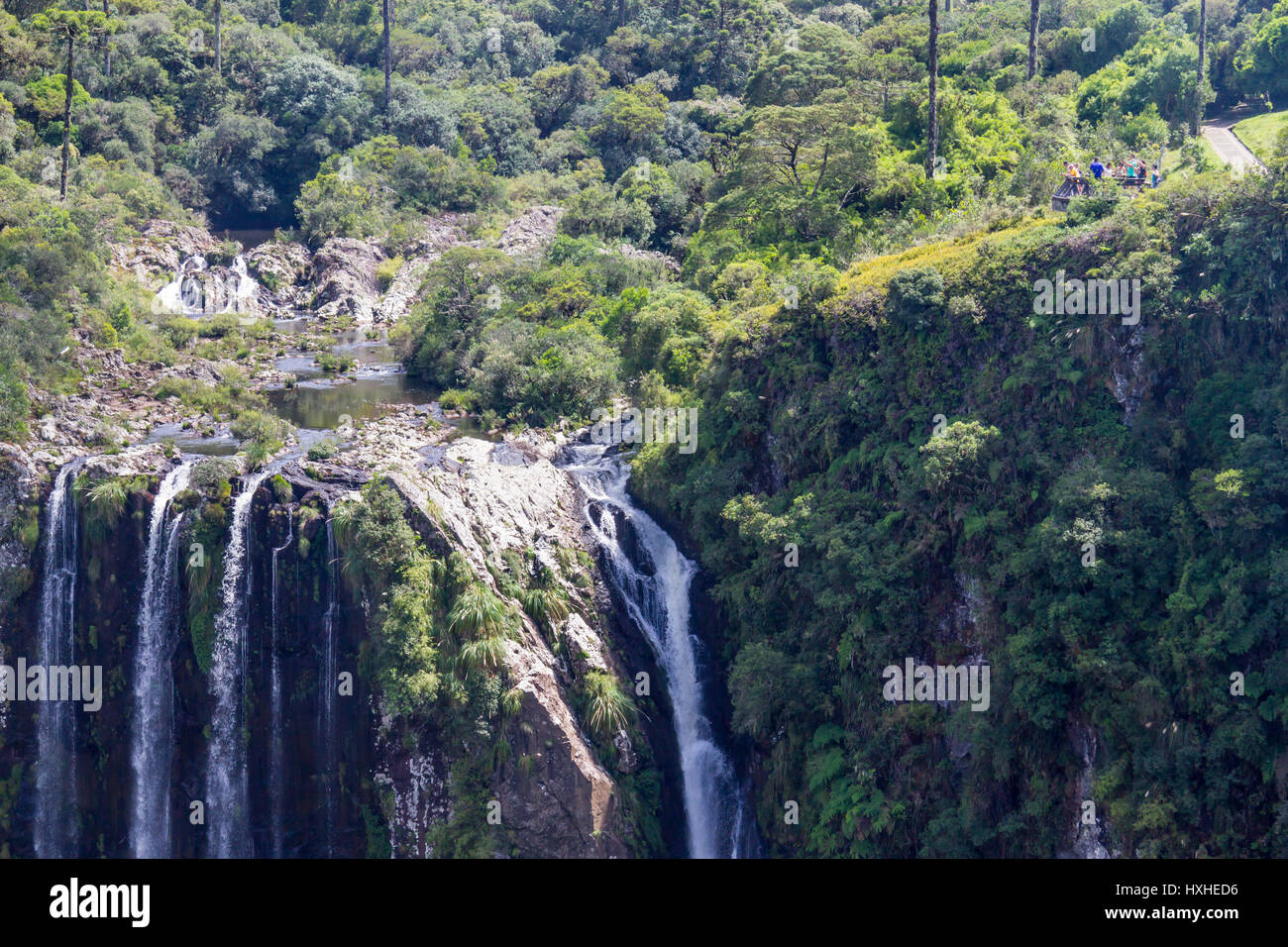 Tourists looking to Waterfall at Itaimbezinho Canyon, Cambara do Sul ...