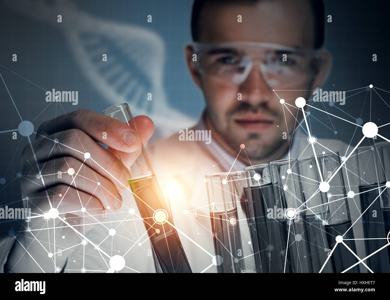 Portrait of concentrated male scientist working with reagents in laboratory Stock Photo - Alamy