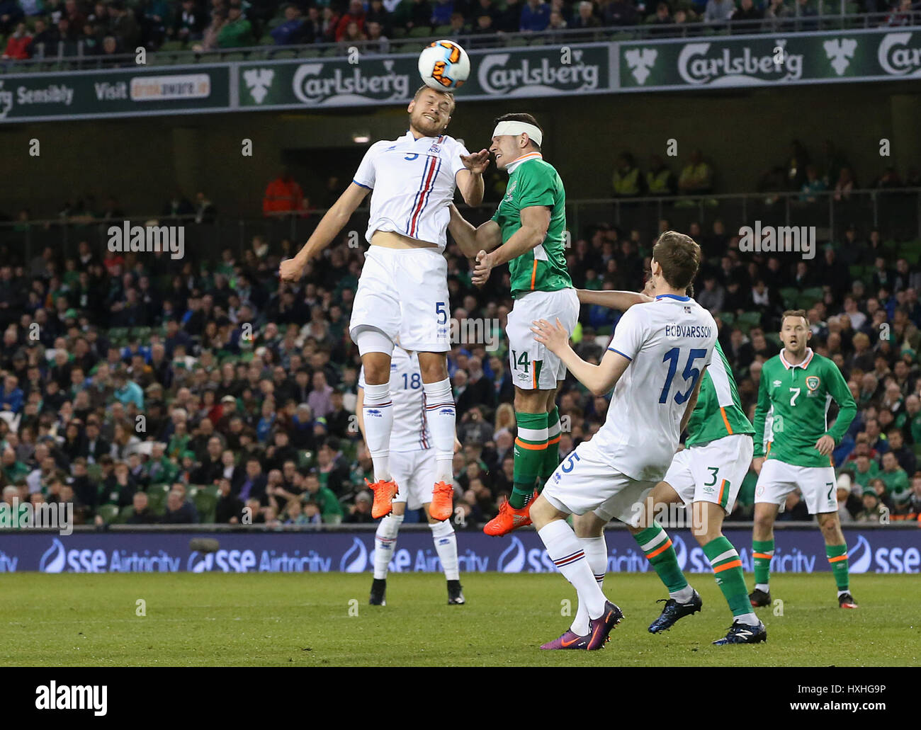 Iceland's Sverrir Ingi Ingason (left) and Republic of Ireland's John ...
