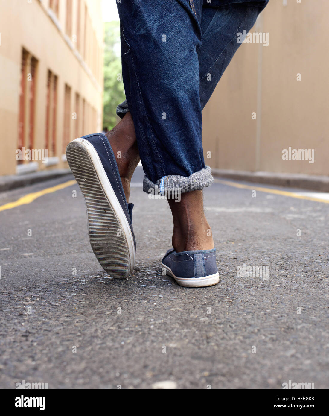 Person low angle from behind hi-res stock photography and images - Alamy