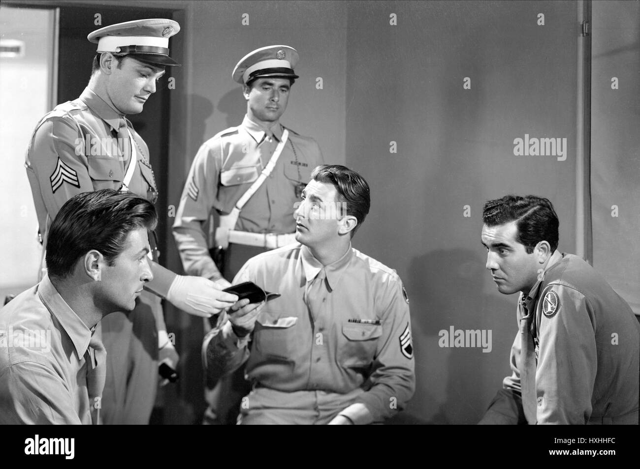 LEX BARKER, ROBERT MITCHUM, ROBERT YOUNG, CROSSFIRE, 1947 Stock Photo ...