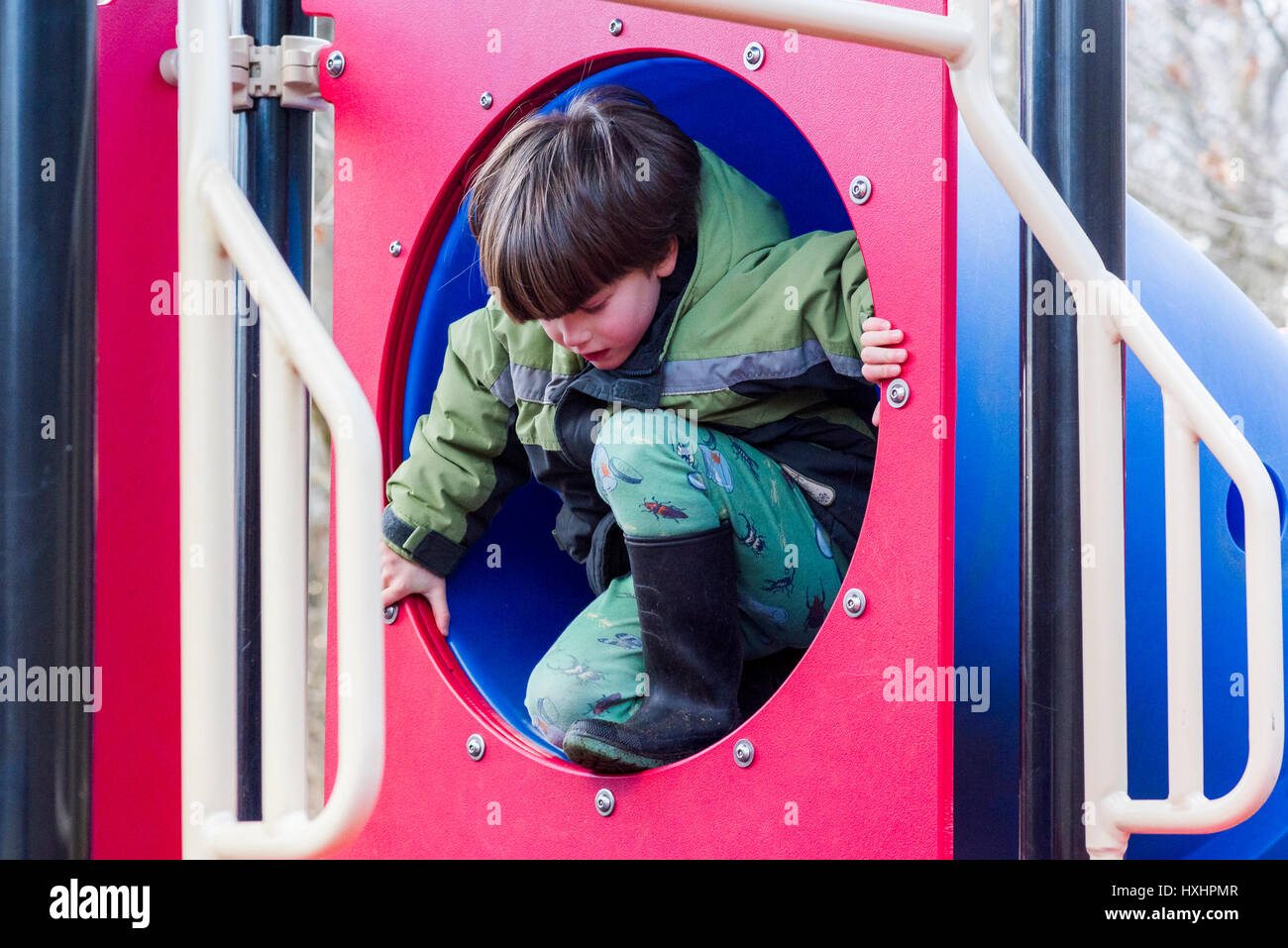 Boy at playground hi-res stock photography and images - Alamy