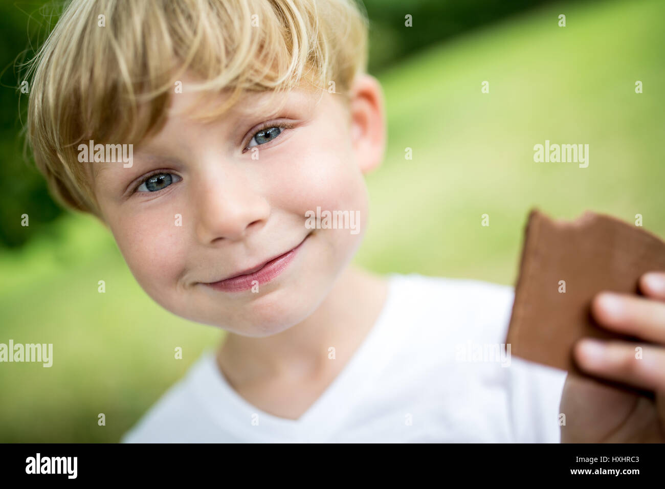 Mouth eating cookie hi-res stock photography and images - Alamy