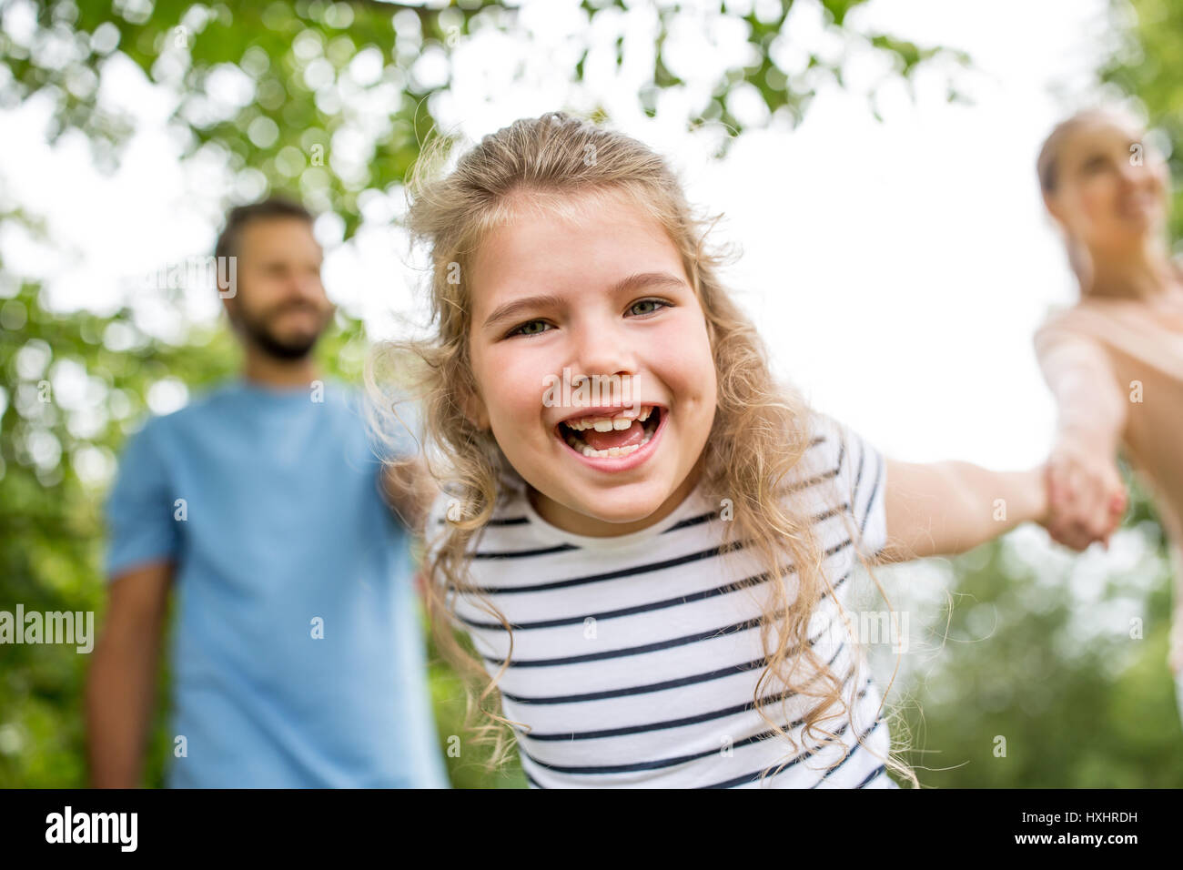 Family with child laughing hi-res stock photography and images - Alamy