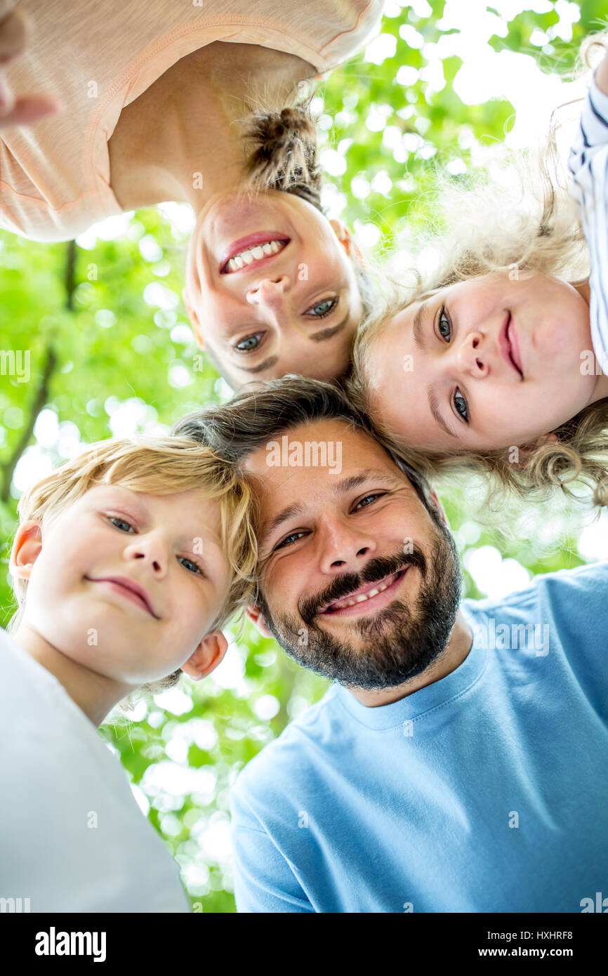 Happy father with family together in harmony Stock Photo - Alamy