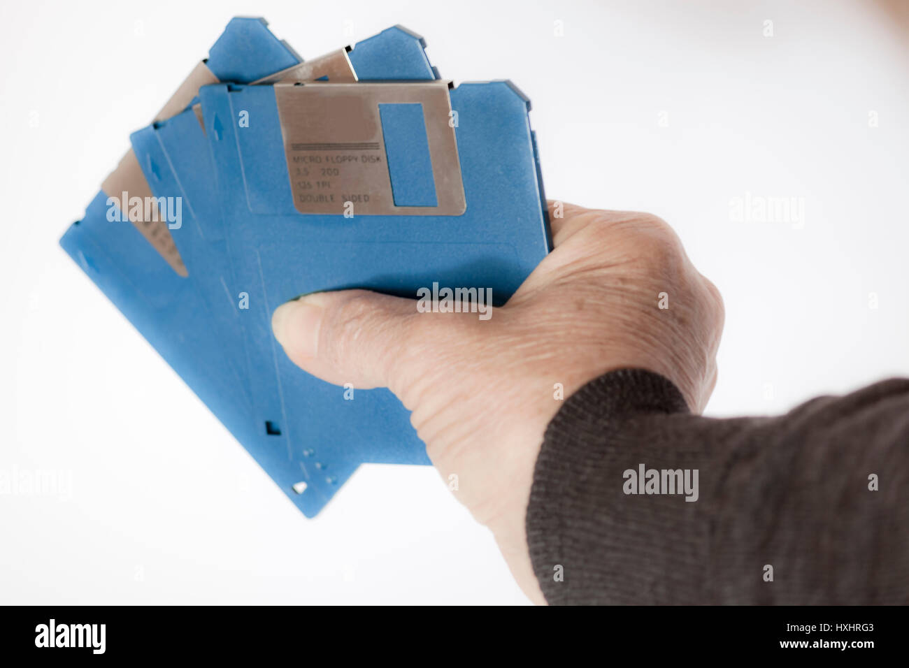 Hand holding floppy disk hi-res stock photography and images - Alamy
