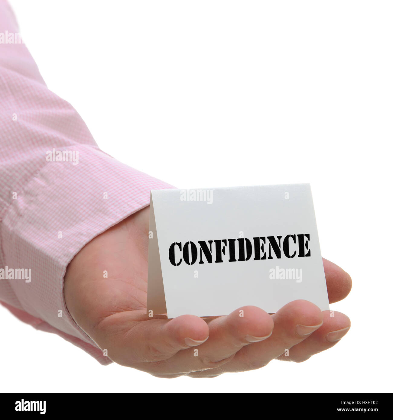 Business man holding confidence sign on hand Stock Photo - Alamy