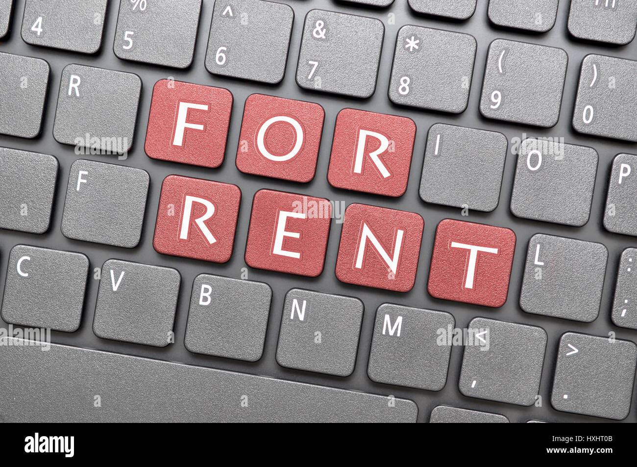 Red for rent key on keyboard Stock Photo - Alamy