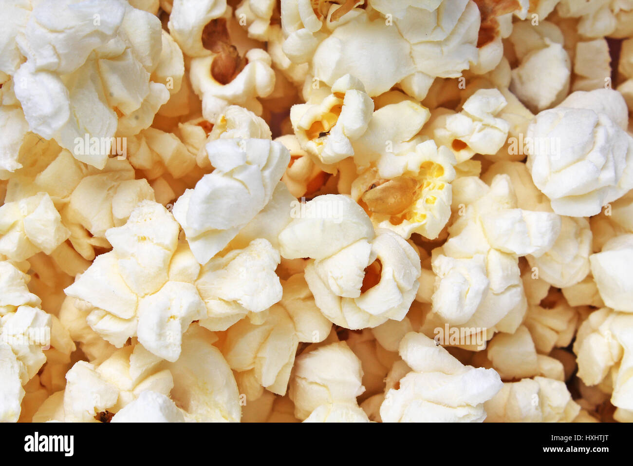 Popcorn texture. Popcorn snacks as background Stock Photo - Alamy