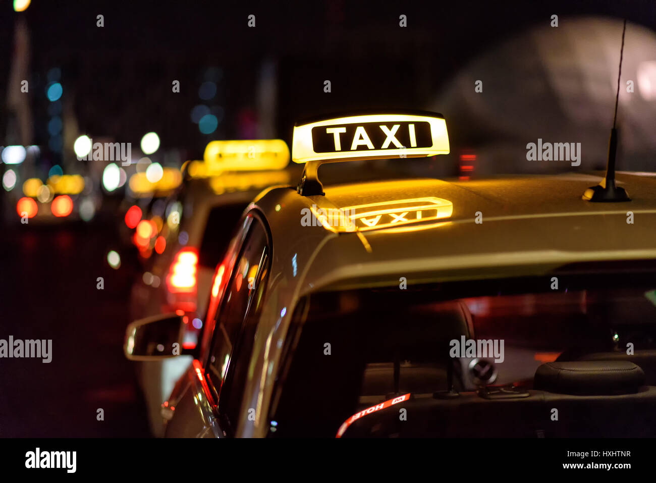 Lighted taxi sign waiting hi-res stock photography and images - Alamy
