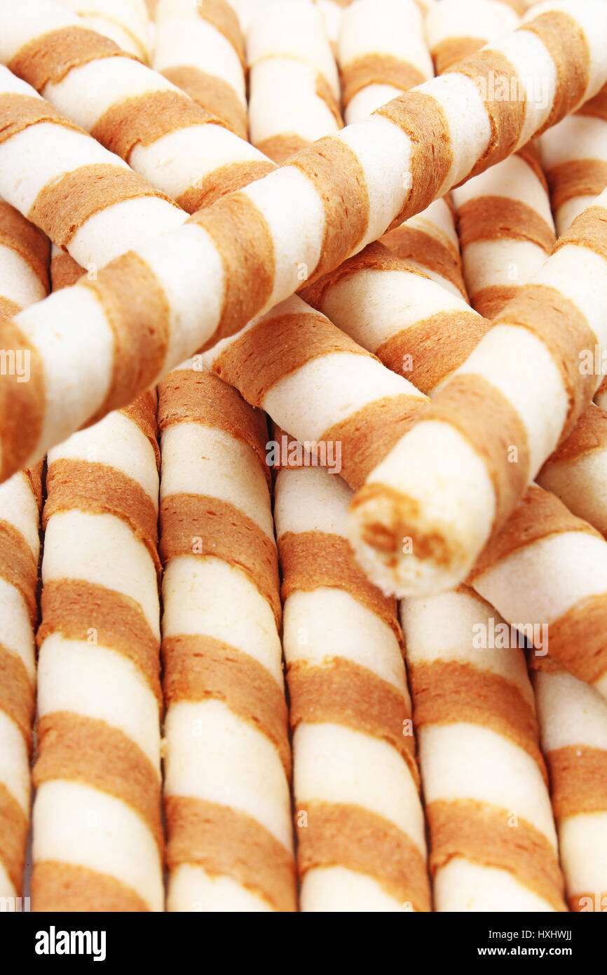 Ice cream wafer sticks as background. Wafer biscuit swirled stick ...