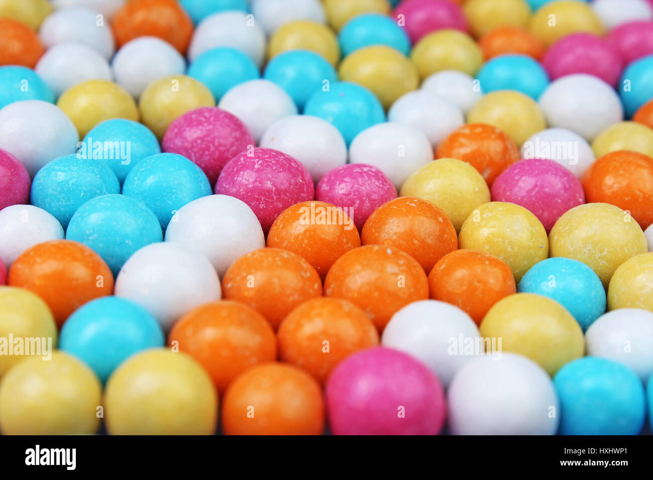 Bubble gum chewing gum texture. Rainbow multicolored gumballs chewing ...