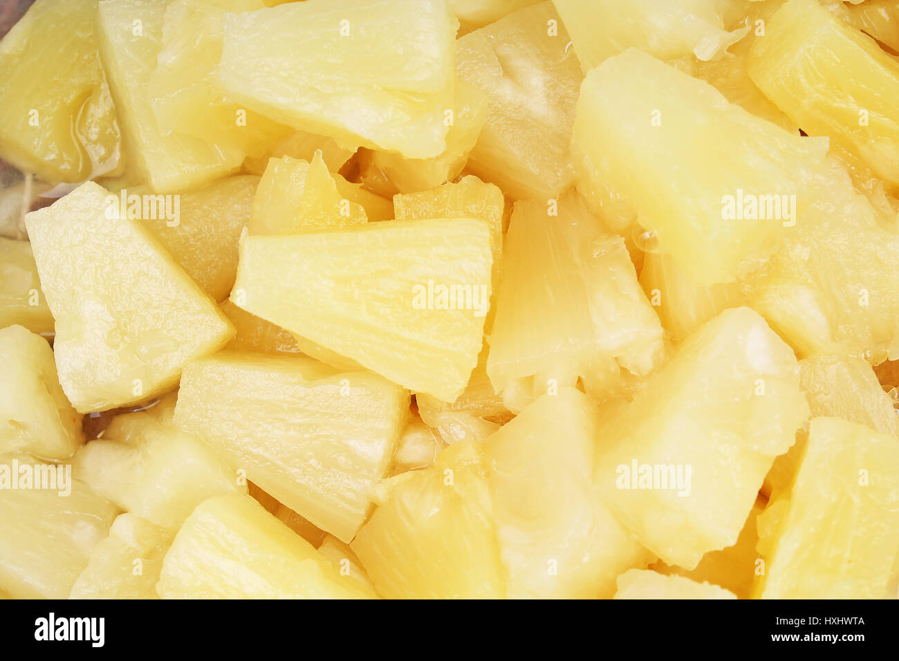 Pineapple slices as background. Yellow pineapples texture pattern Stock ...