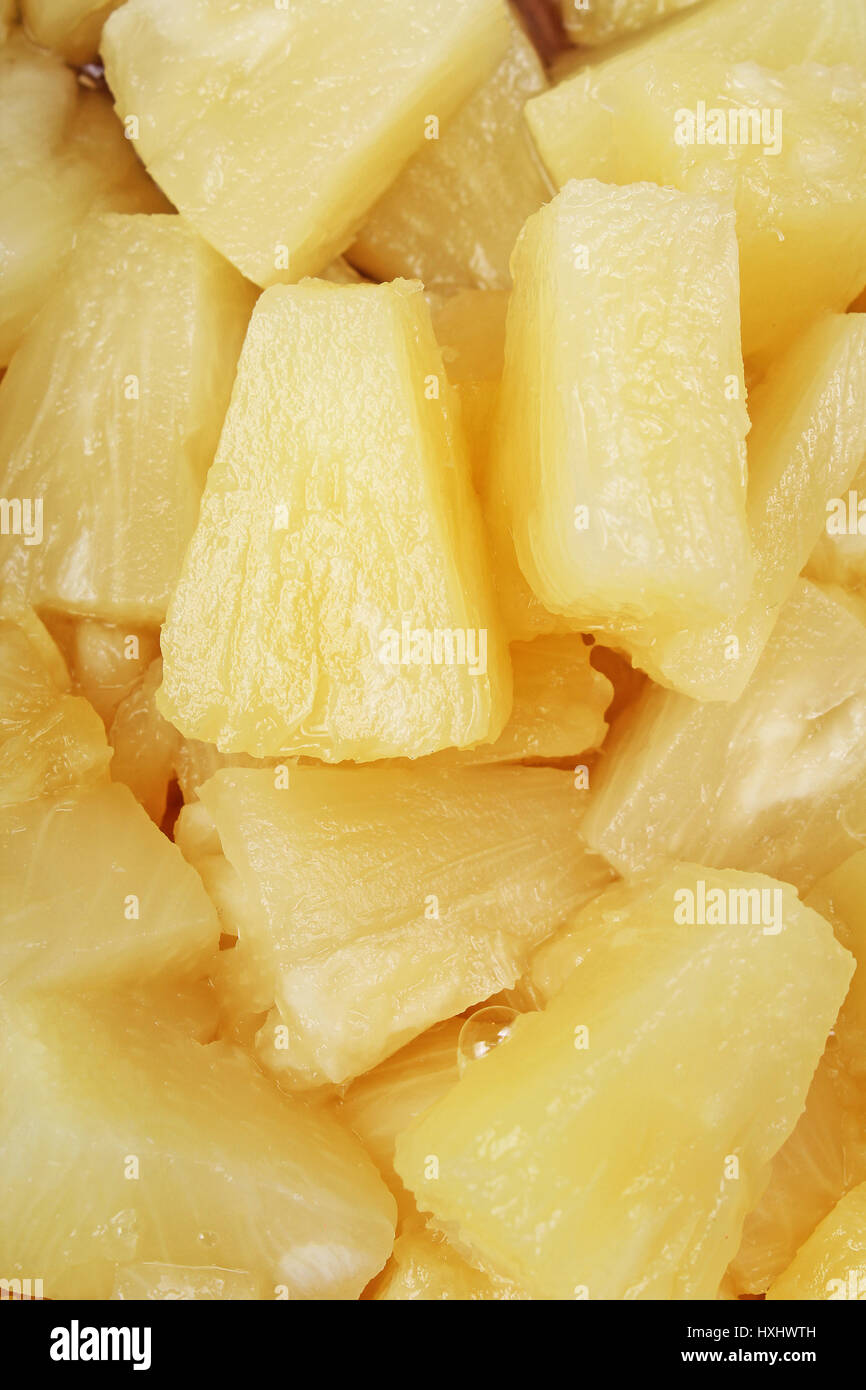 Pineapple slices as background. Yellow pineapples texture pattern Stock ...