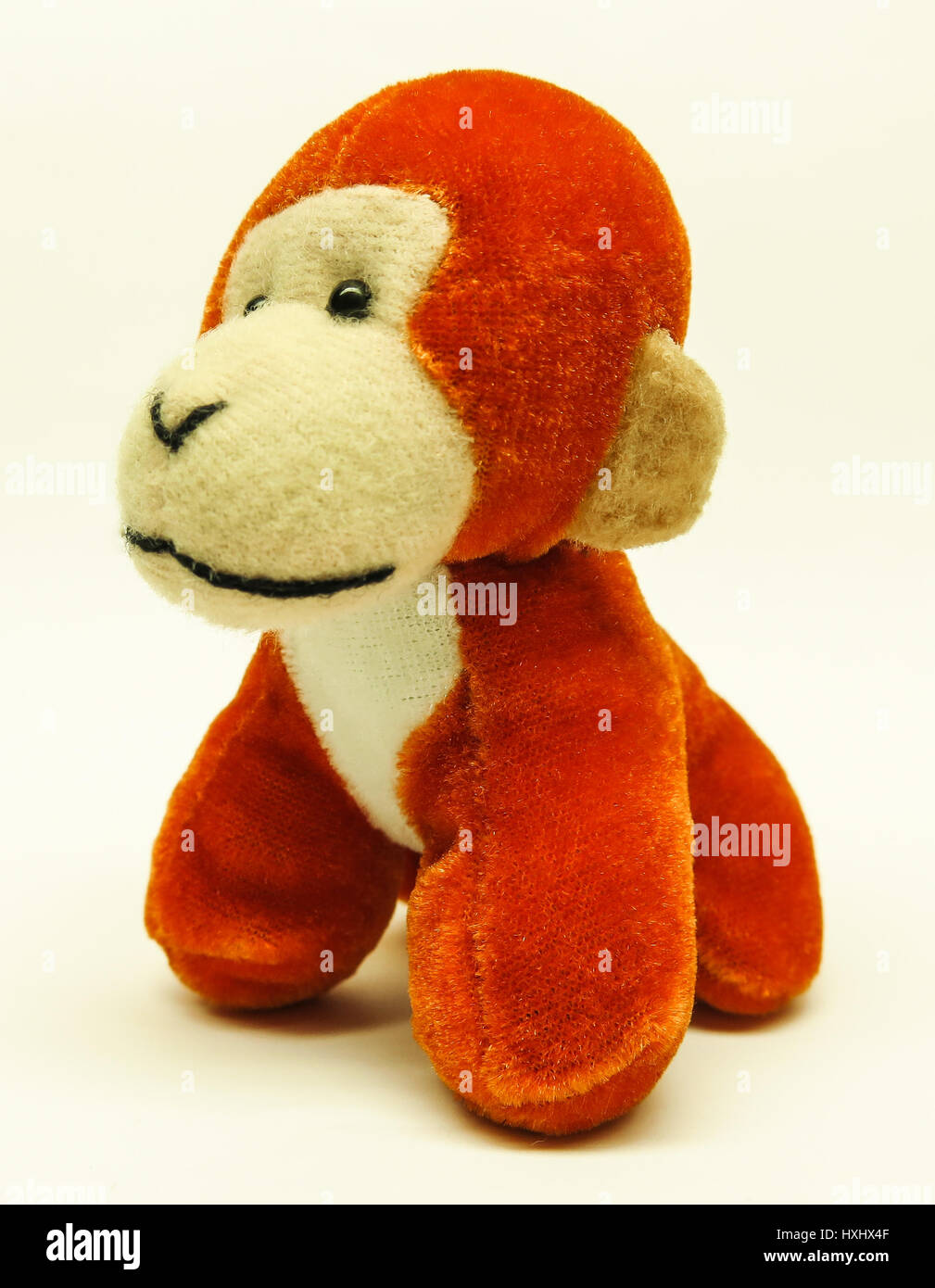 isolated object soft toy monkey on a white background Stock Photo - Alamy