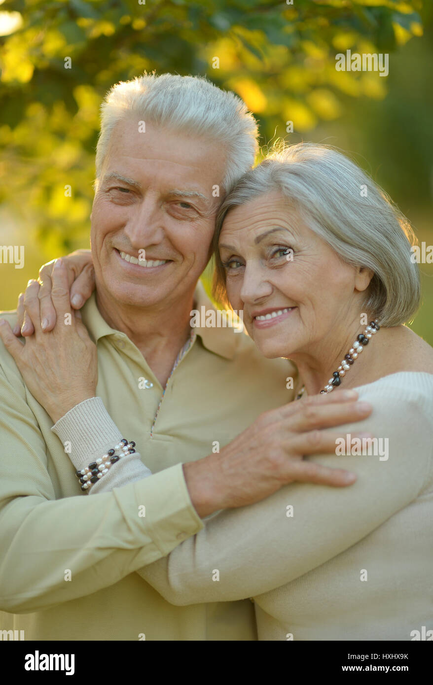 Happy white family embracing outdoors hi-res stock photography and ...