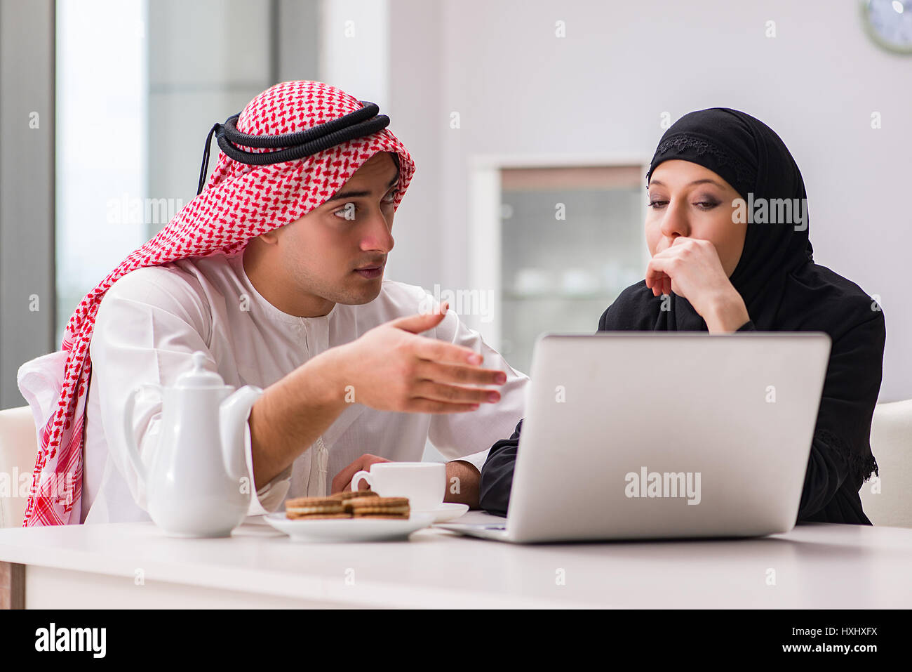Pair of arab man and woman Stock Photo - Alamy