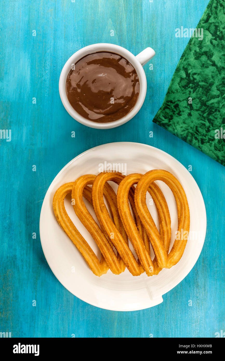 A plate of churros, traditional Spanish, especially Madrid, dessert ...