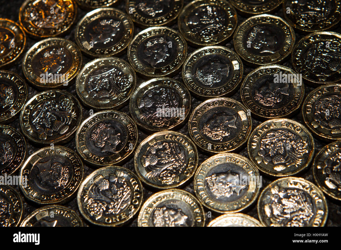The new 12 twelve sided £1 one pound coin enters circulation, London ...