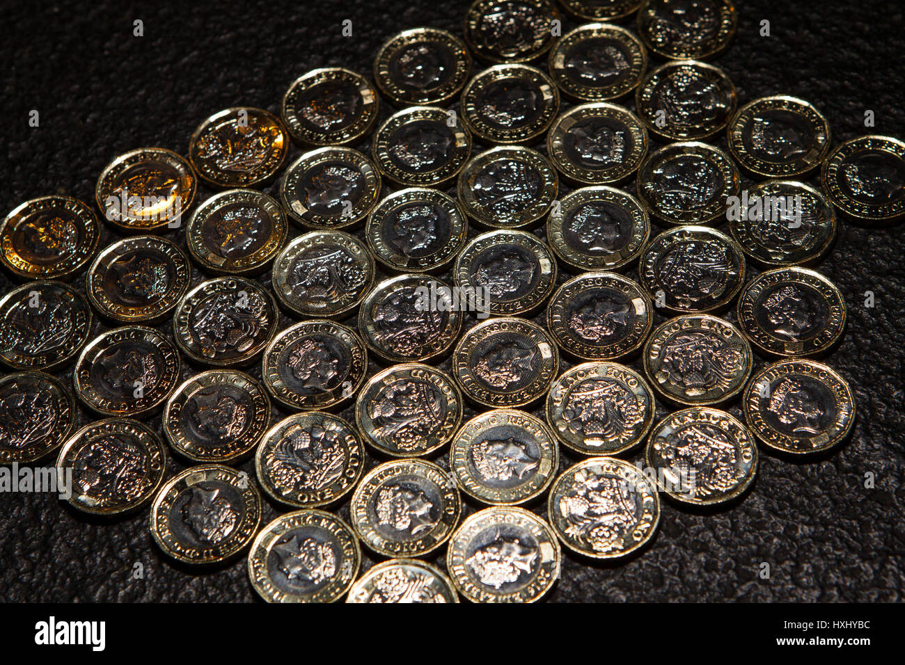 The new 12 twelve sided £1 one pound coin enters circulation, London ...