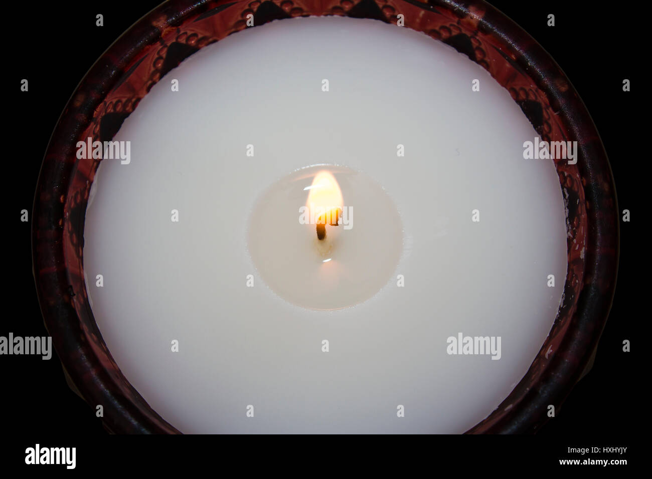 One candle flame at night closeup - isolated, macro Stock Photo - Alamy