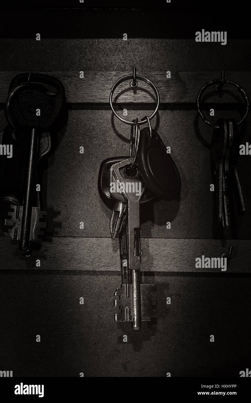 Car and house keys hanging on wall Stock Photo - Alamy