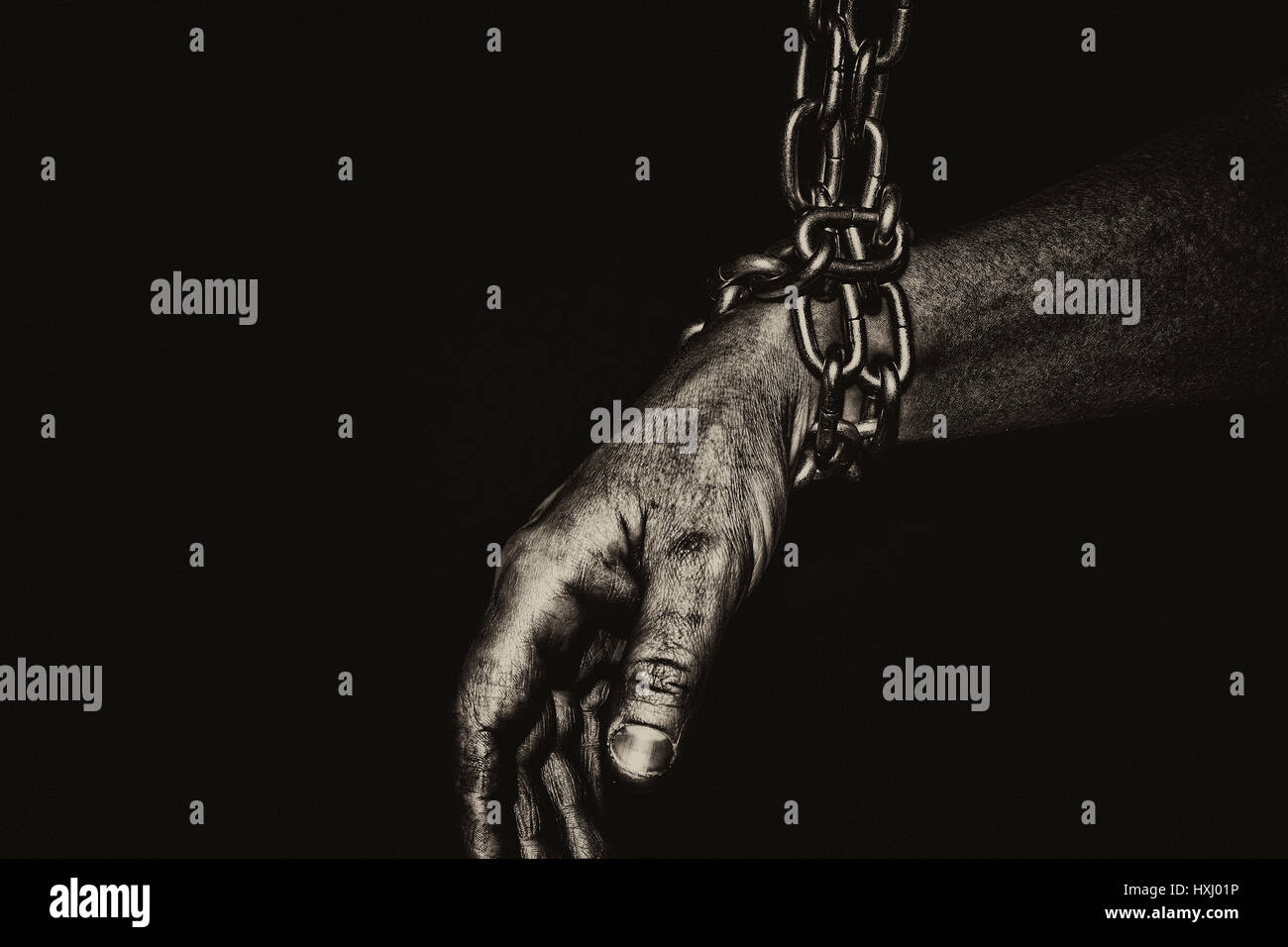 Hand with CHAIN Stock Photo - Alamy