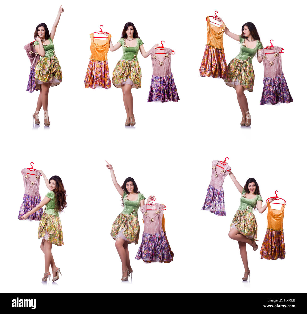 Woman trying to choose dress on white Stock Photo - Alamy